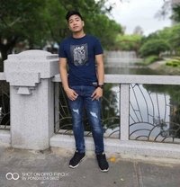 John Sy, Filipino masseur in Manila